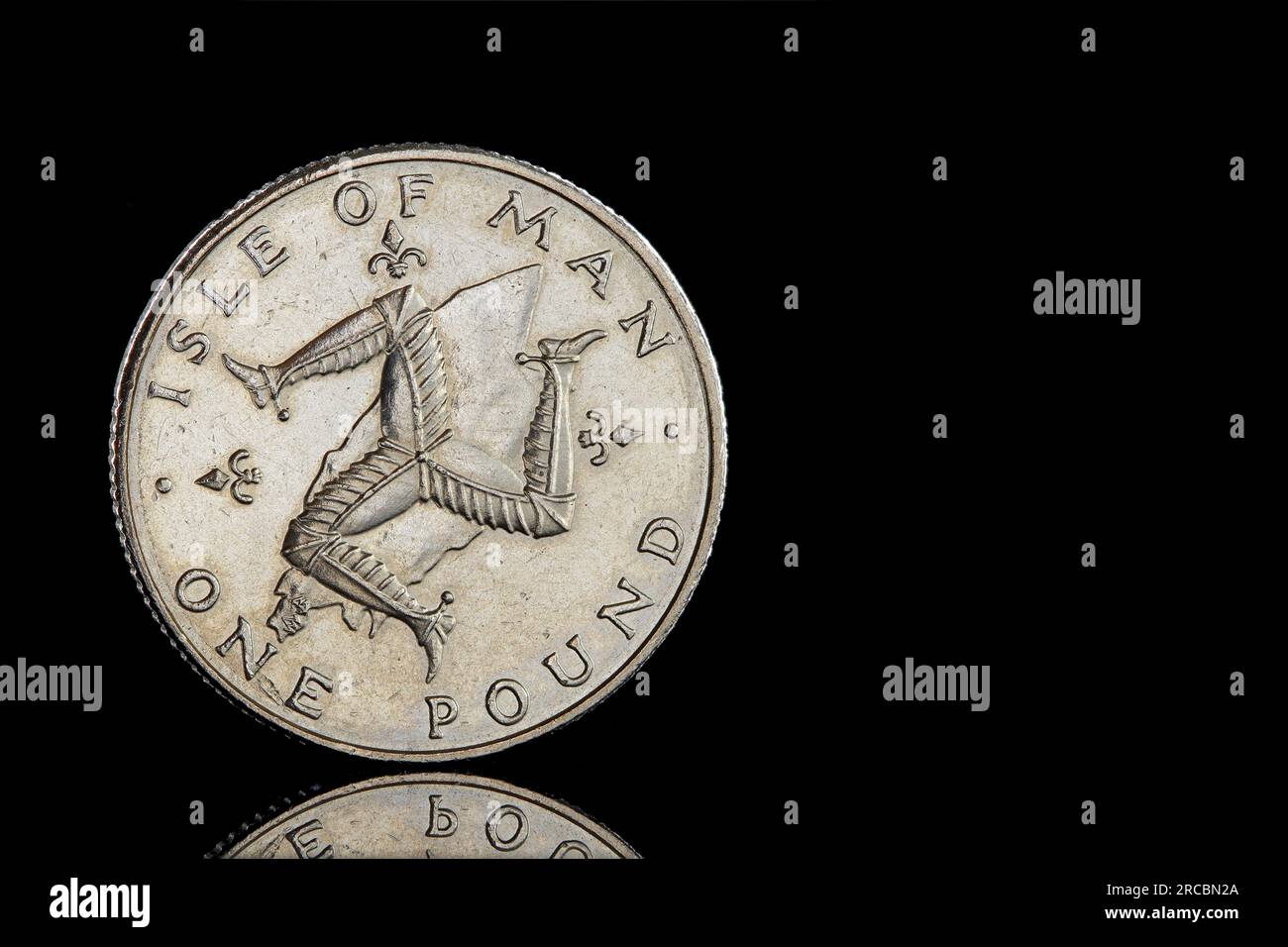 1978 Isle Of Man One Pound coin reverse featuring the country's Flag ...