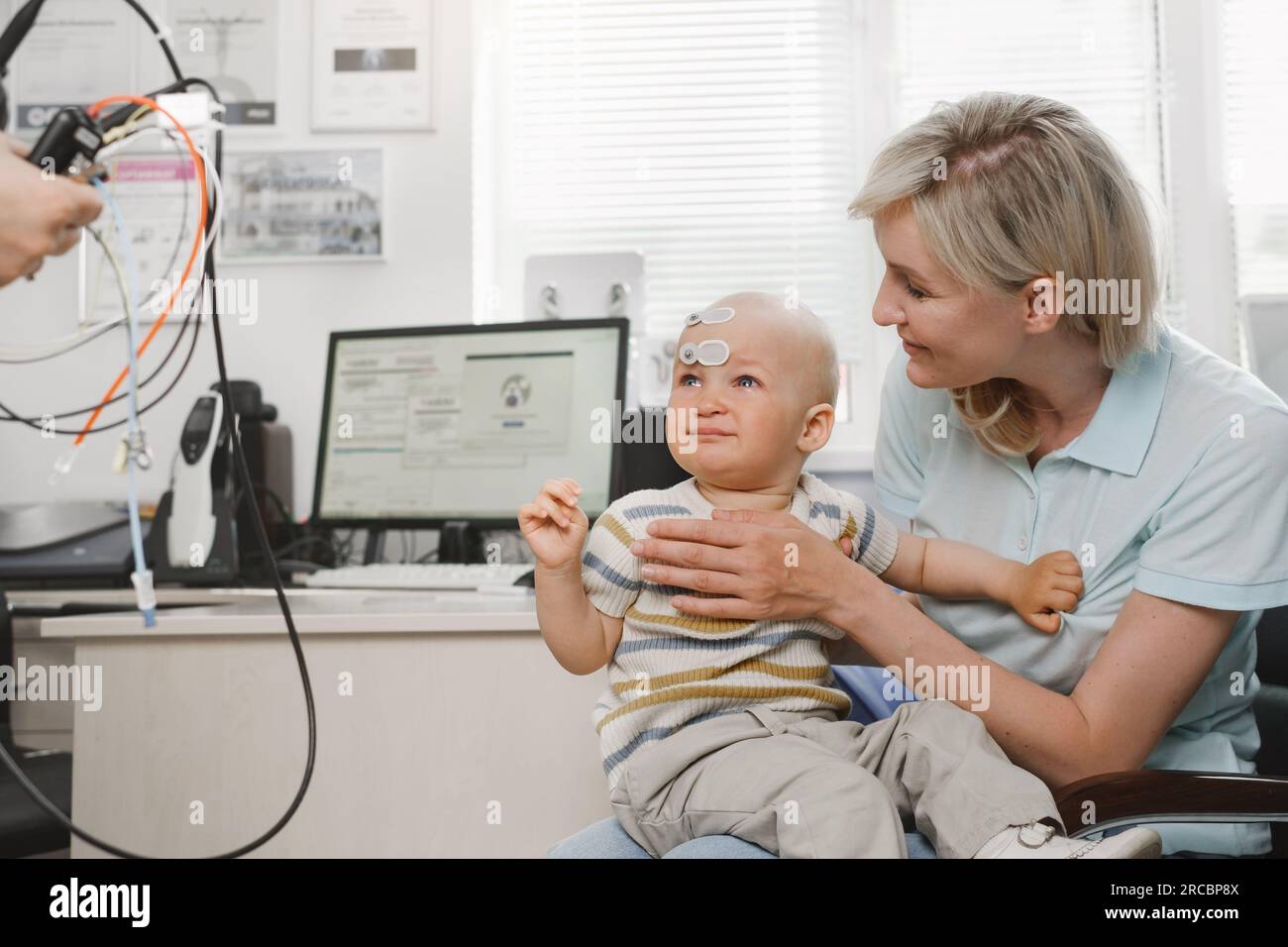 Mother baby visit pediatrician hi-res stock photography and images - Alamy