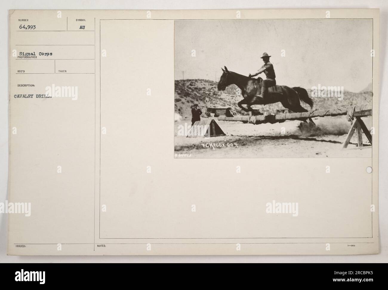 Soldiers participating in a cavalry drill during World War One. The soldiers are seen riding on ...