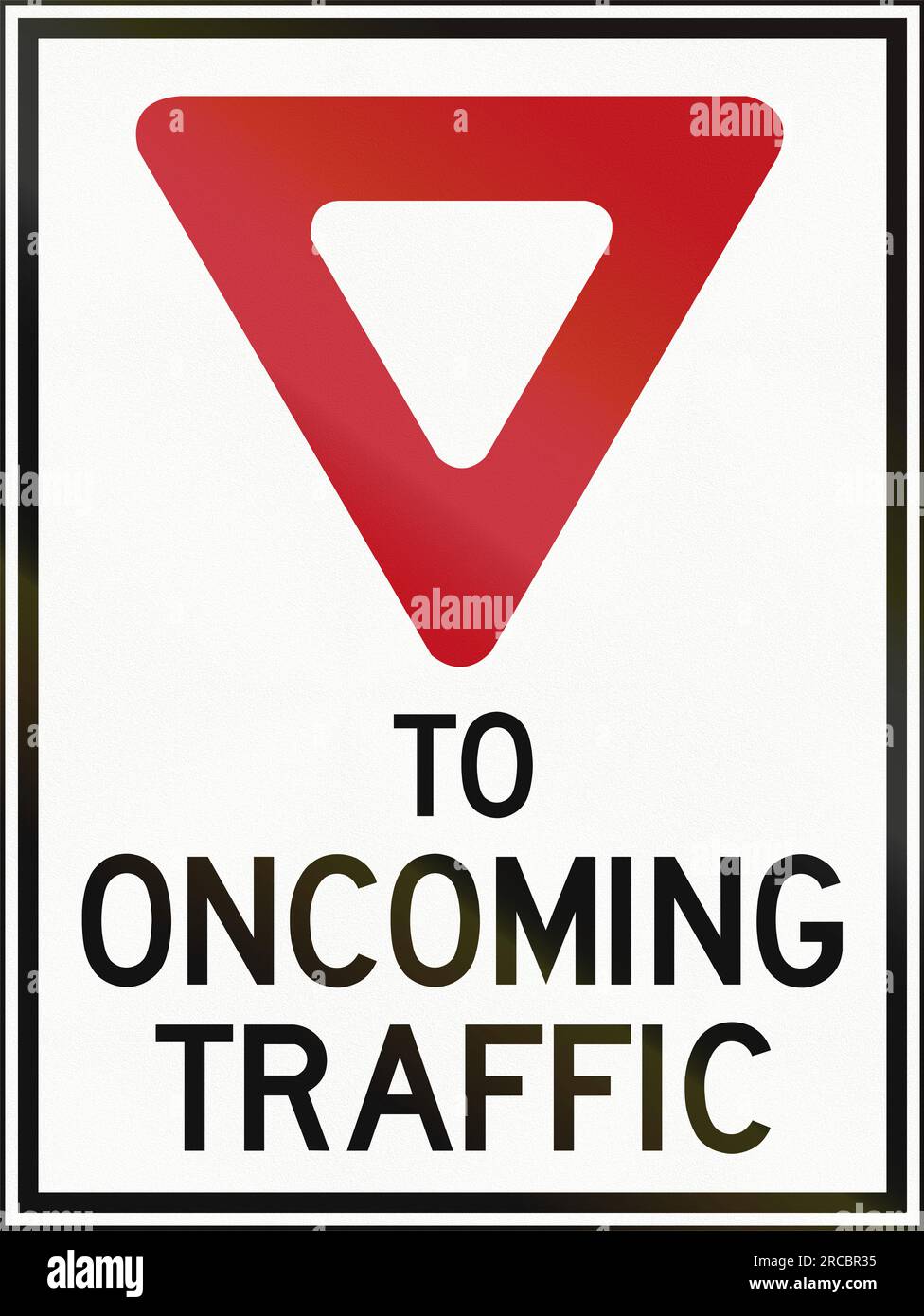 A Canadian traffic sign - Give way to oncoming traffic. This sign is ...