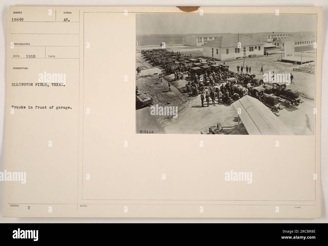 Trucks parked in front of a garage at Ellington Field, Texas during World War One. The ...