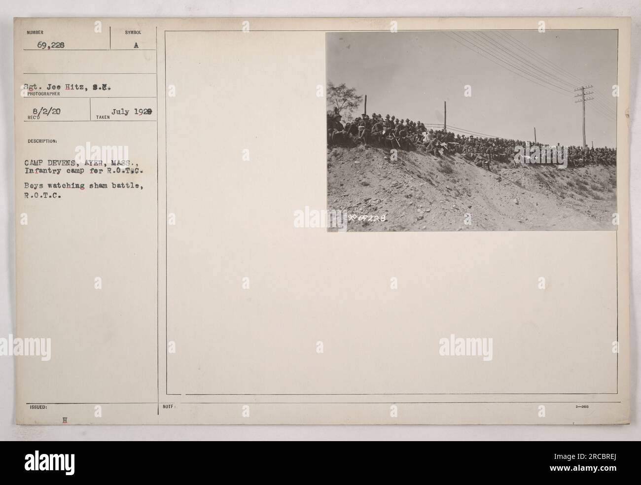 ROTC boys at Camp Devens in Ayer, Massachusetts, observe a sham battle ...