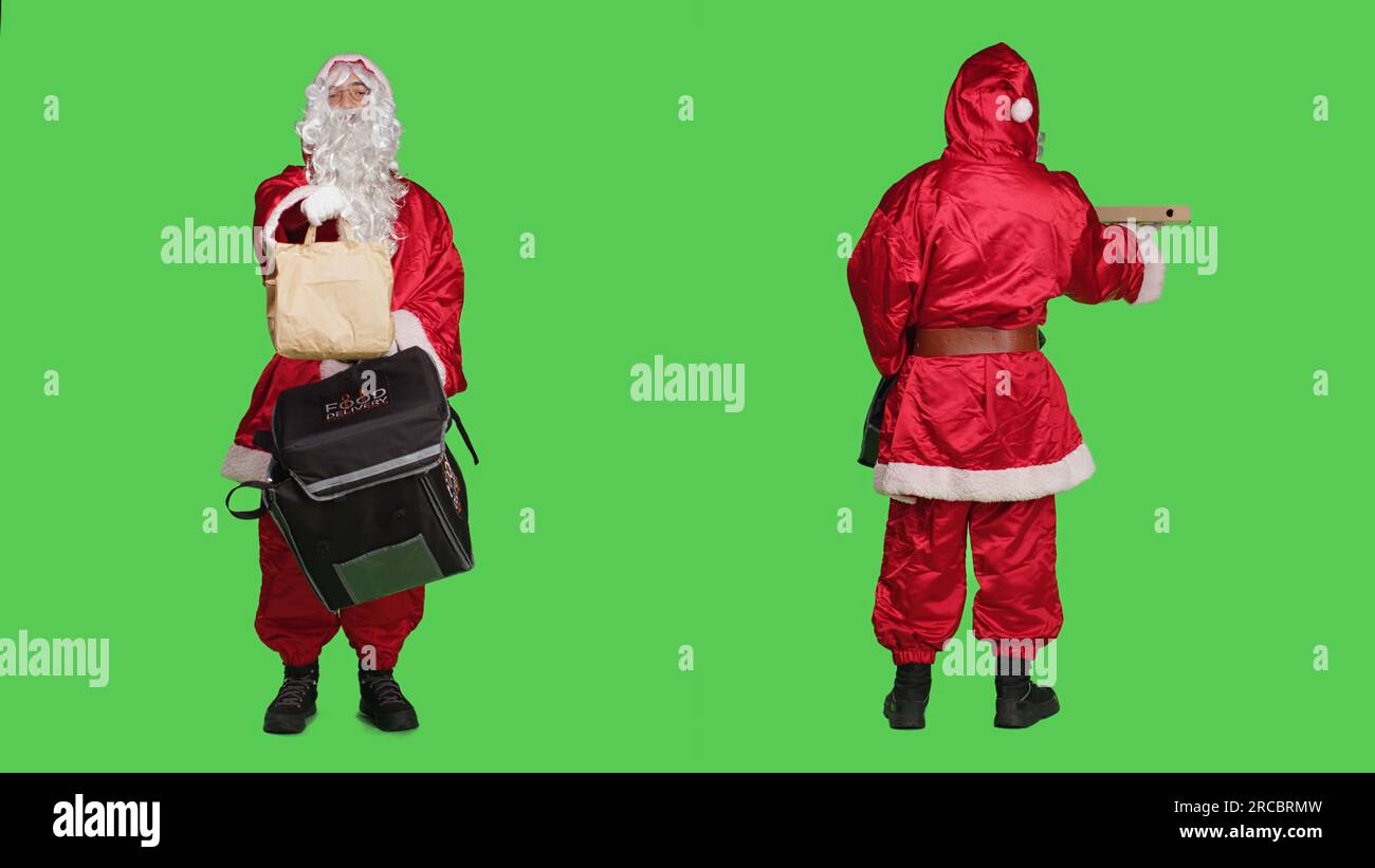 Deliveryman in red santa suit carrying backpack with pizza box and ...