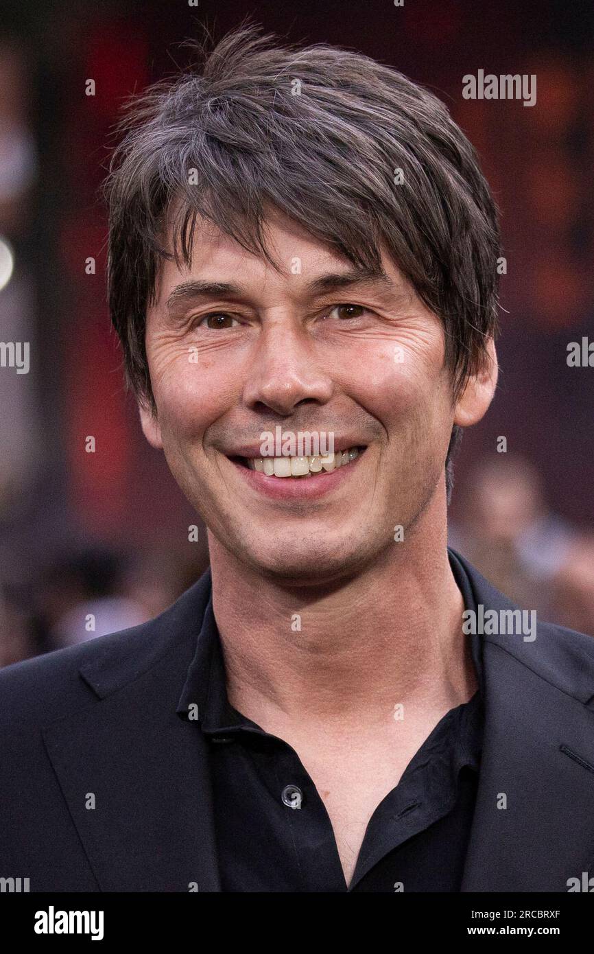 Professor Brian Cox poses for photographers upon arrival at the ...