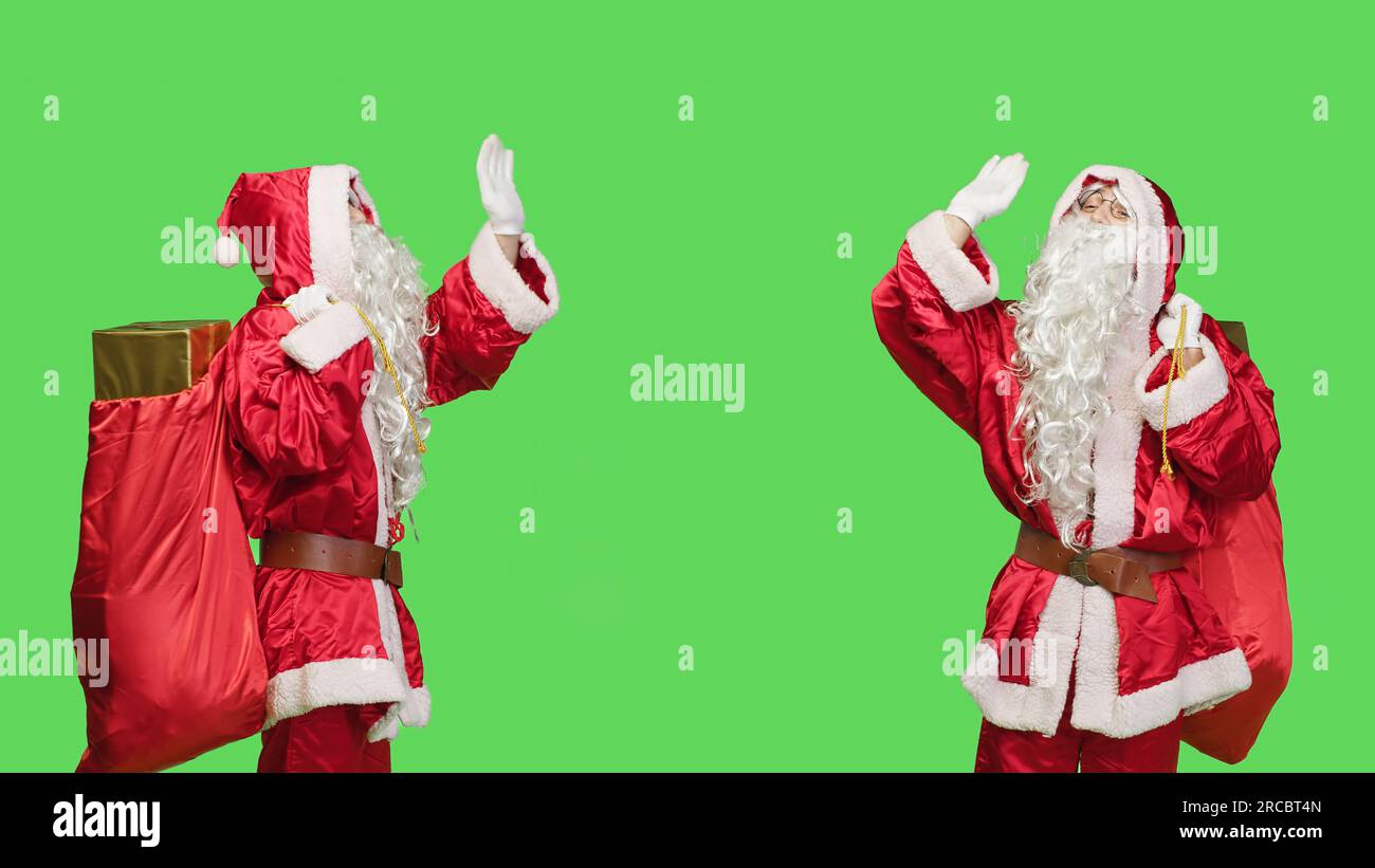 Joyful santa waving hello goodbye hi-res stock photography and images ...