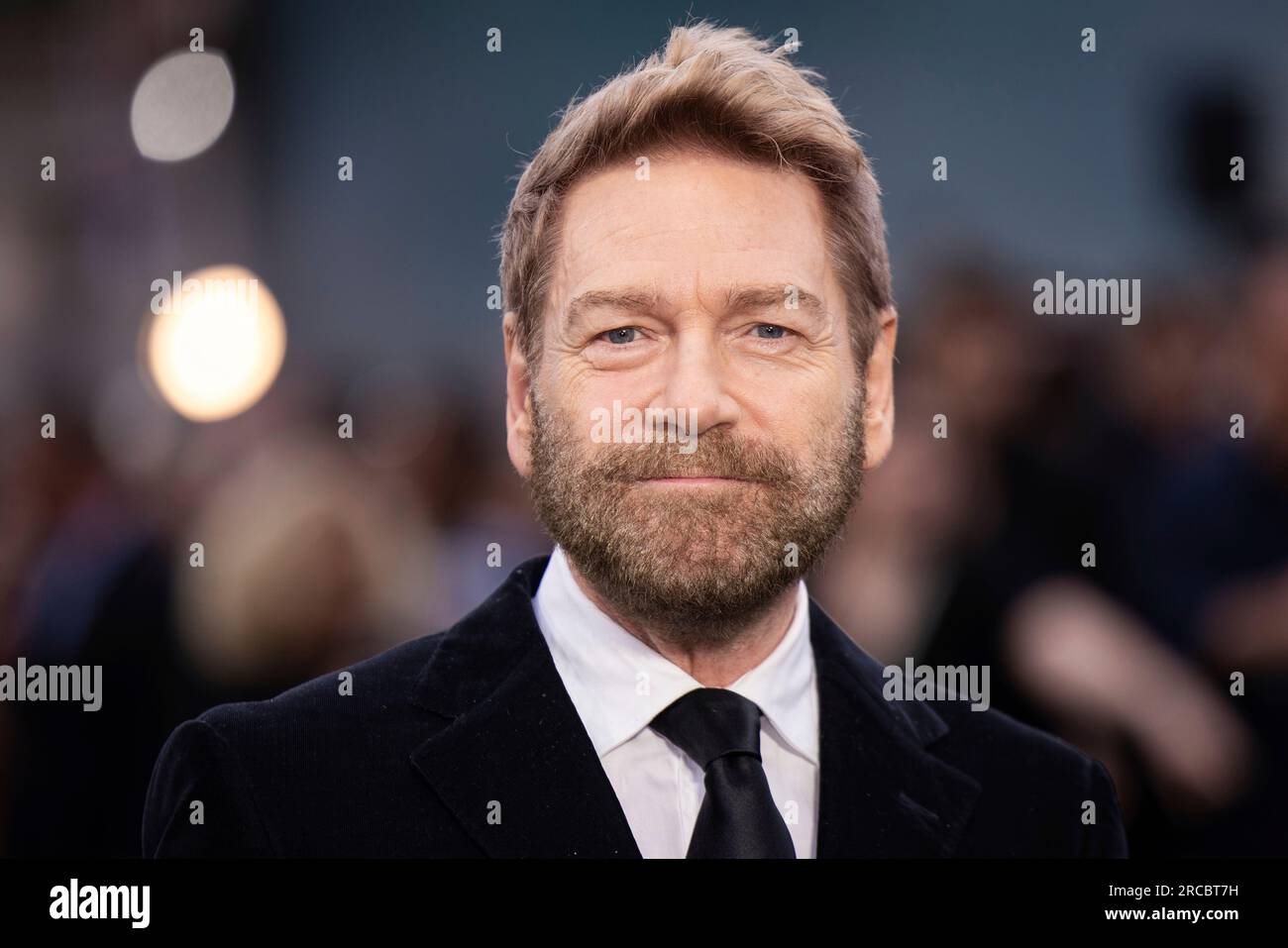 Kenneth Branagh poses for photographers upon arrival at the premiere for the film 'Oppenheimer ...