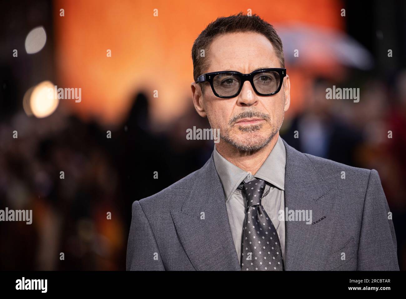 Robert Downey Jr. poses for photographers upon arrival at the premiere ...