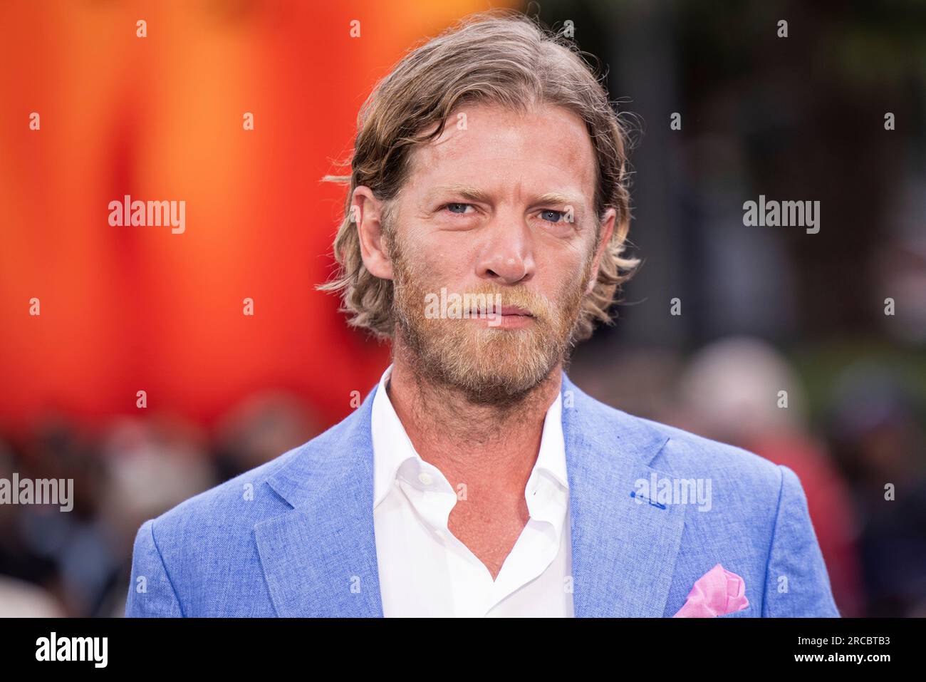 Jefferson Hall poses for photographers upon arrival at the premiere for the film 'Oppenheimer ...