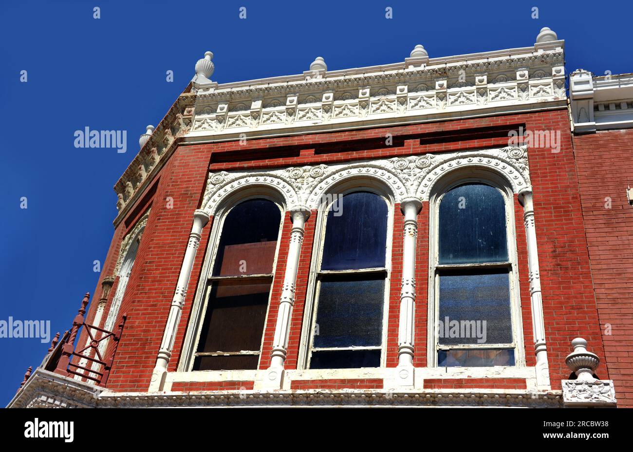 Historic Council Grove National Bank is red brick. It has arched ...