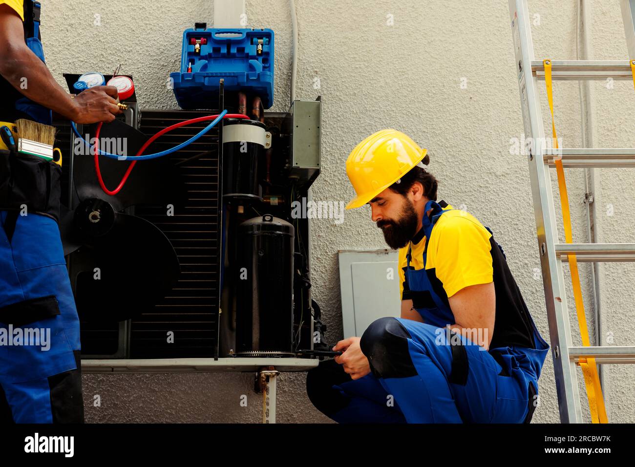 Experts fixing defective blower fan causing frozen evaporator coil ...