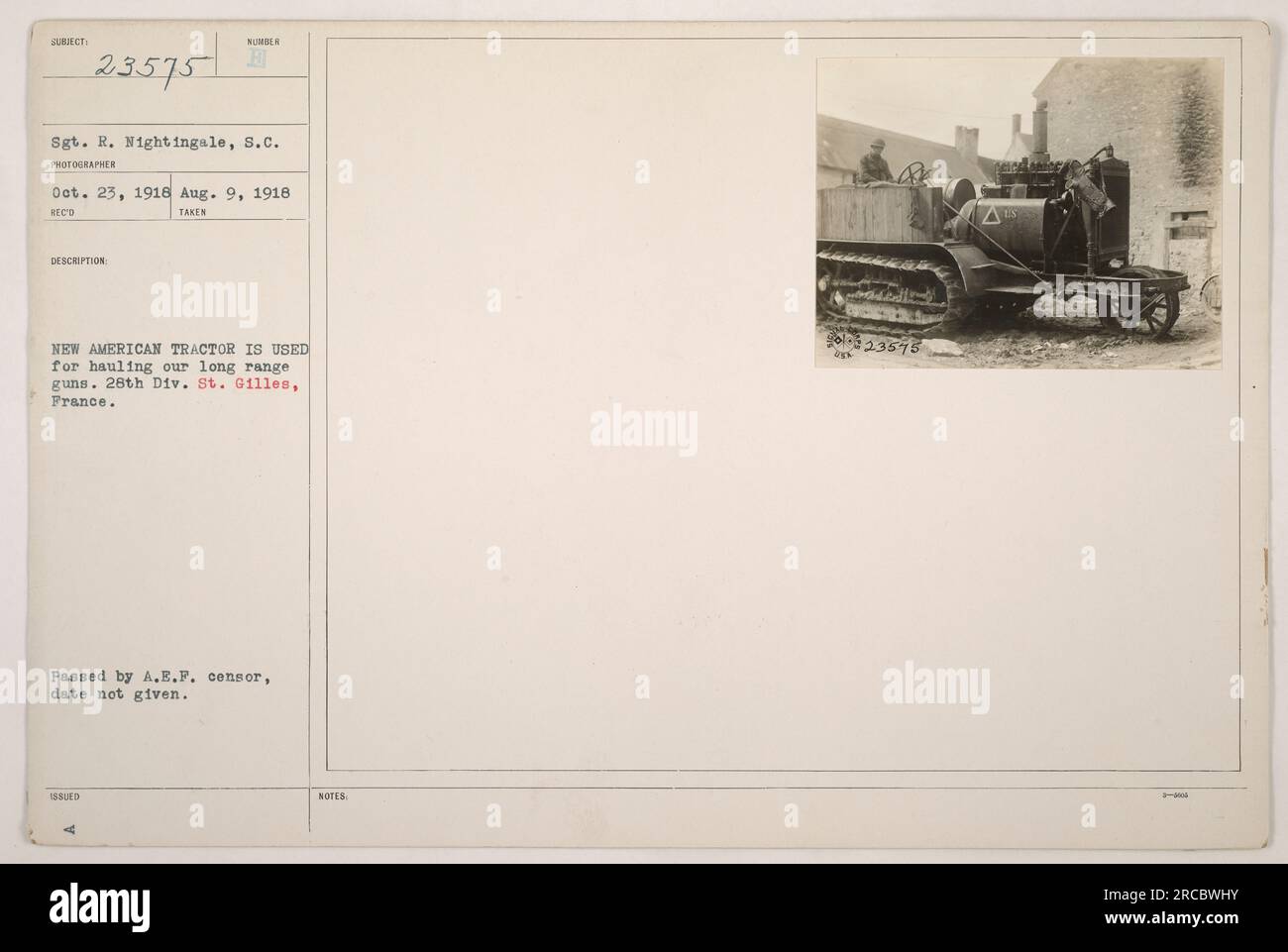 American soldiers using a new American tractor to haul long range guns ...