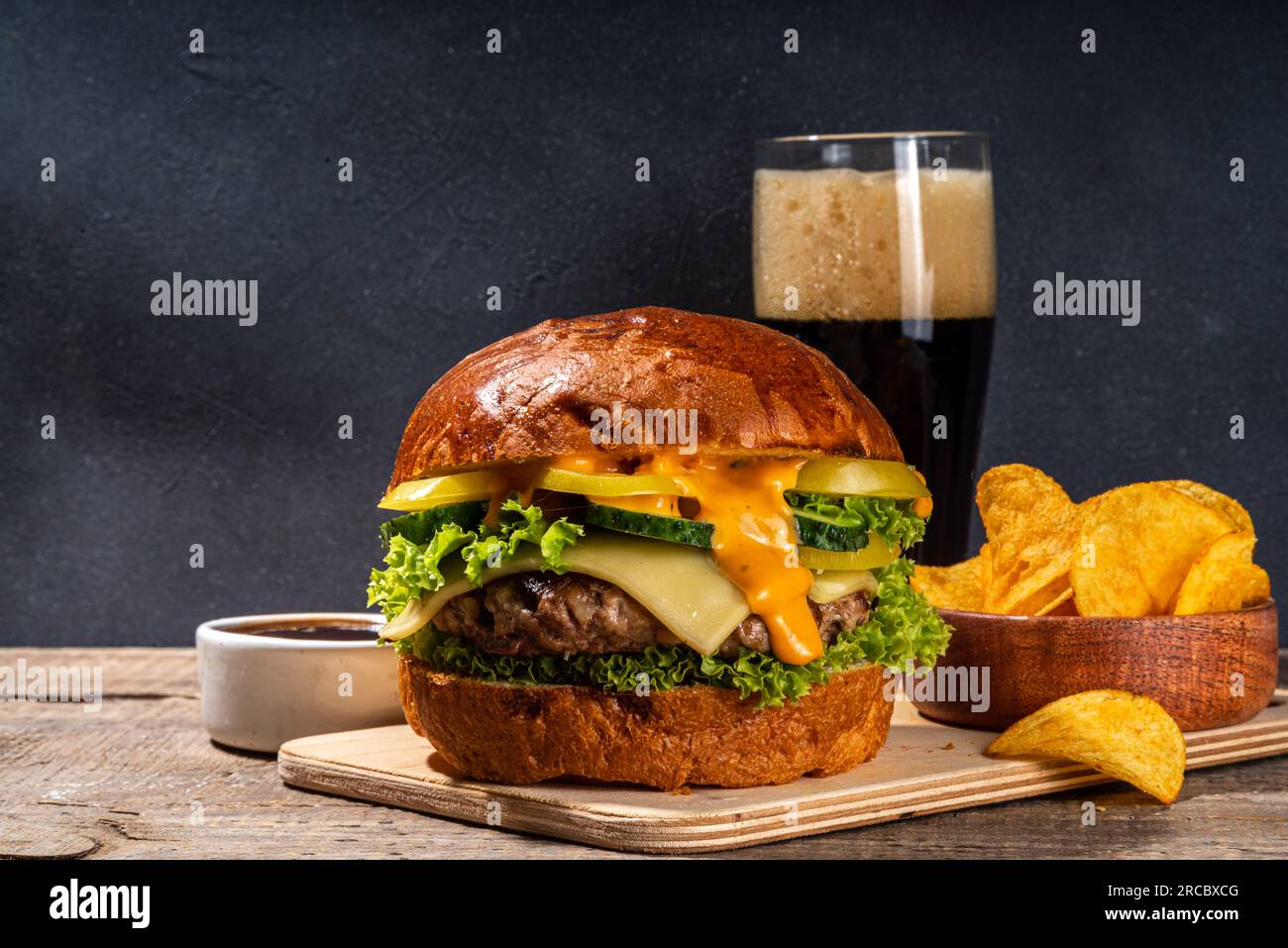 Tasty homemade burger. Set of tasty cheeseburger, beef and ham burger ...