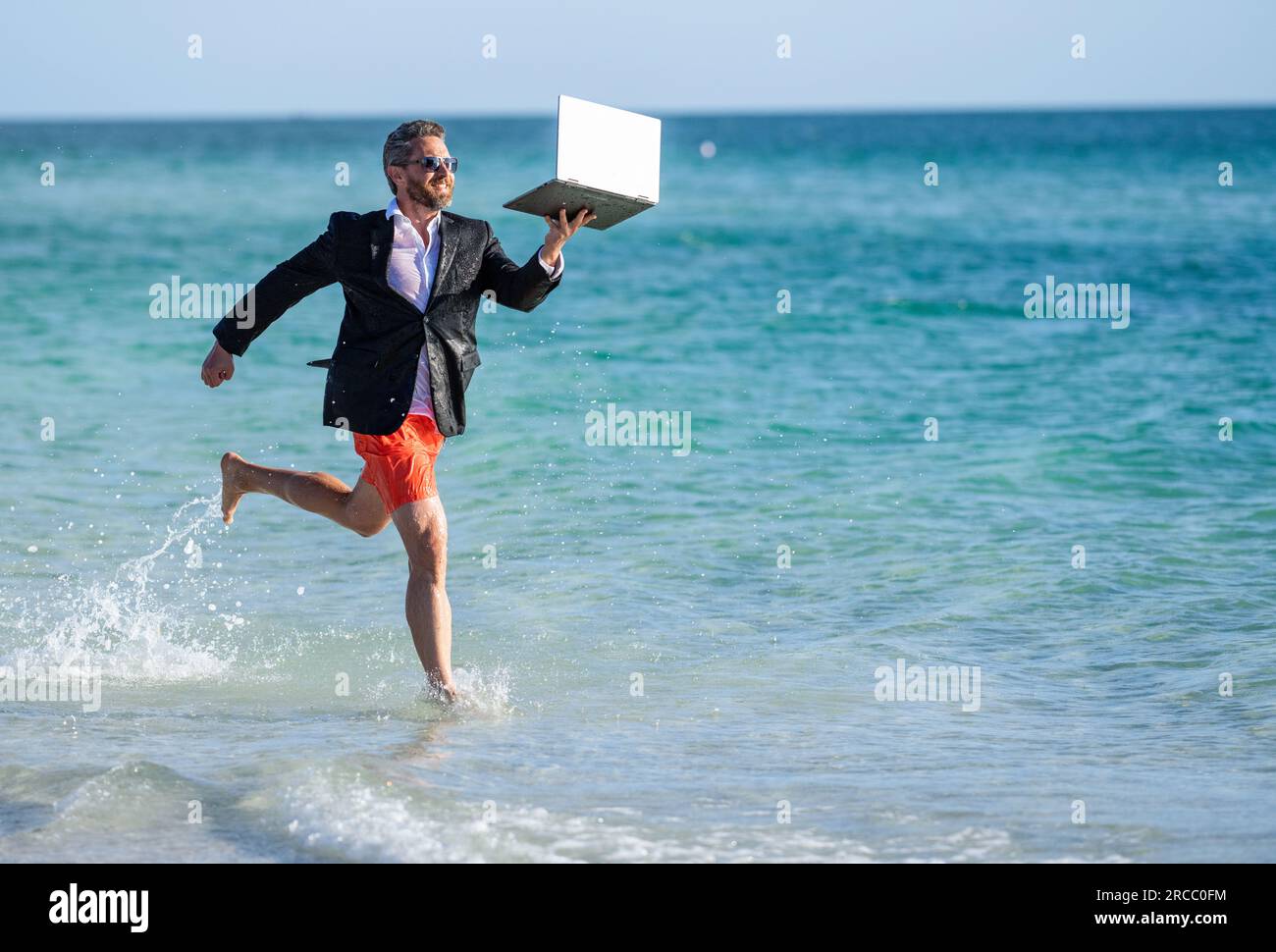 manager businessman relaxing beach. running to success. retreat for the ...