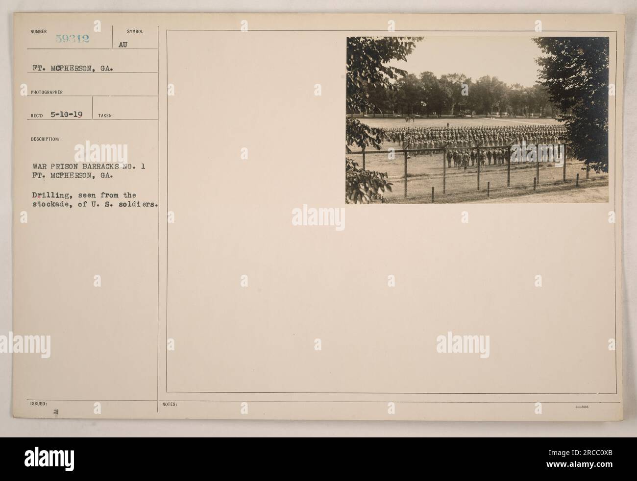 U.S. soldiers are seen drilling from the stockade at War Prison ...