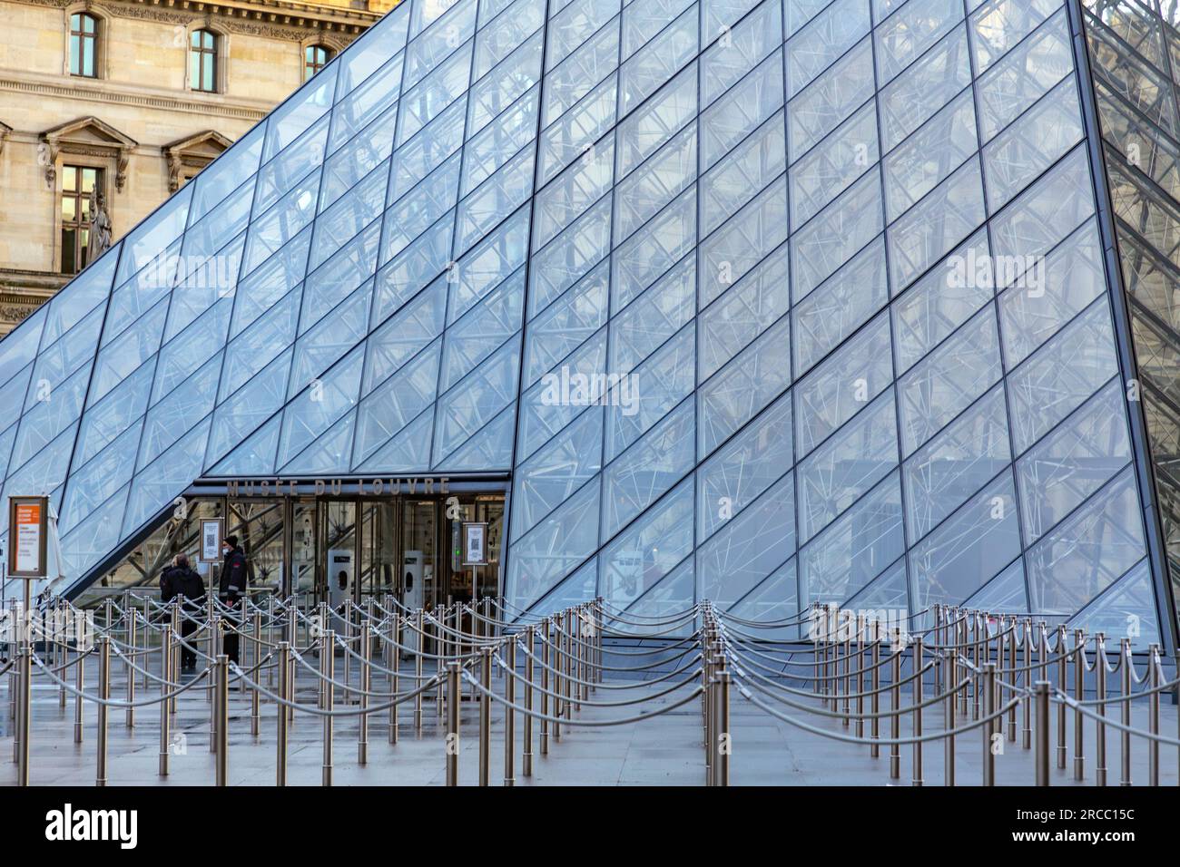 Paris, France - JAN 20, 2022: The glass pyramid of Louvre Museum, the ...