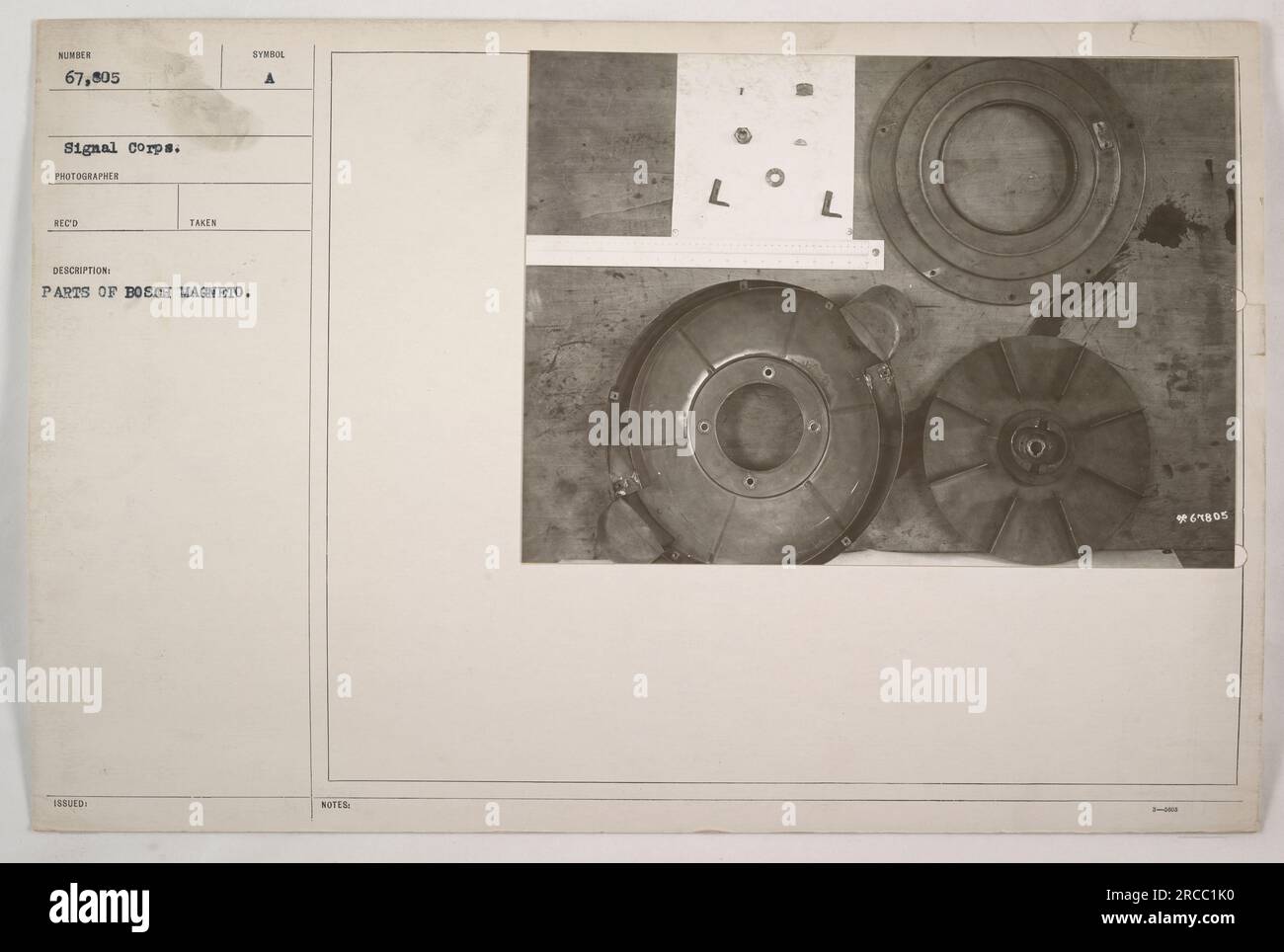 Close-up photograph of various parts of a Bosch magneto, numbered ...