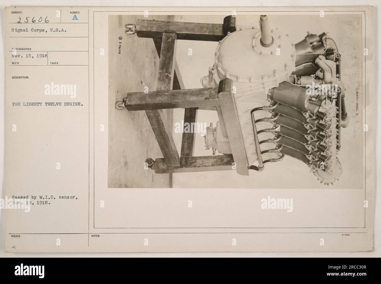 American soldiers inspecting a Liberty Twelve engine during World War ...