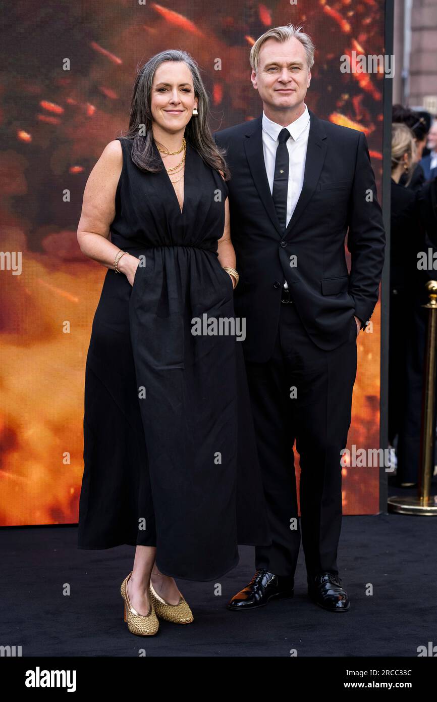 Emma Thomas, left, and Christopher Nolan pose for photographers upon ...