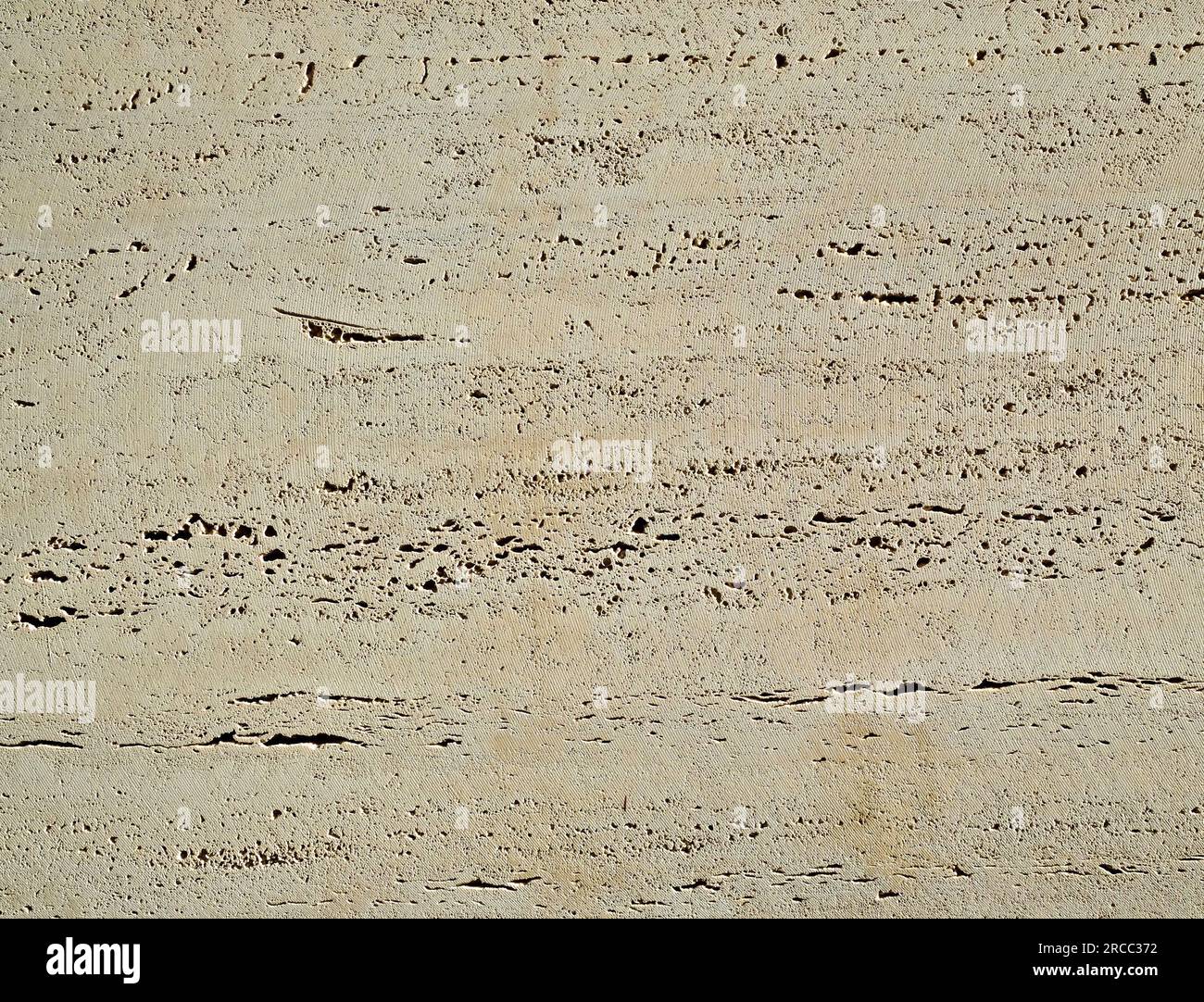 Marble surface with visible mineral inclusions and texture left by the ...