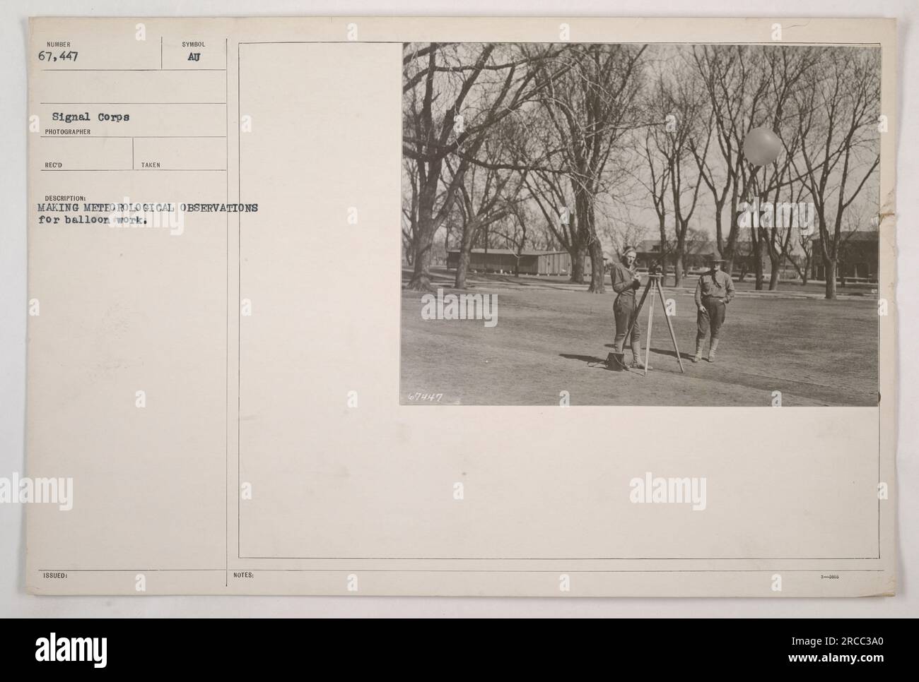 Soldiers conducting meteorological observations for balloon work during ...