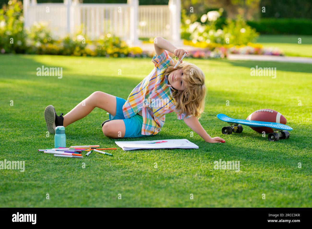 Child artist, kids crafts. School kids drawing in summer park, painting ...