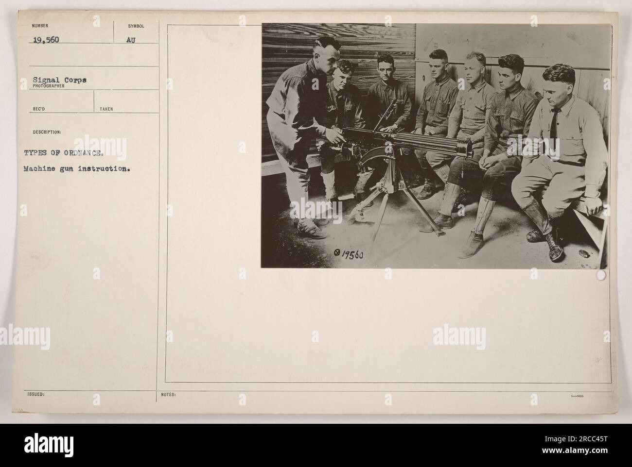 Soldiers receiving instruction on how to operate a machine gun during ...
