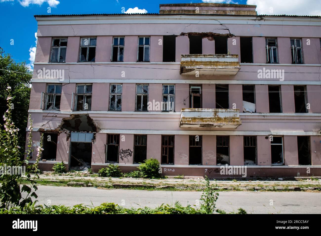 Damaged buildings at Nikopol, Russian army bombs civilian targets and ...