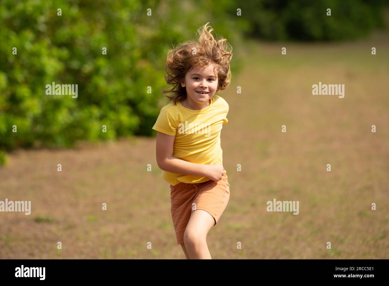 Child running in summer street. Kid enjoy run. Kid running on ...