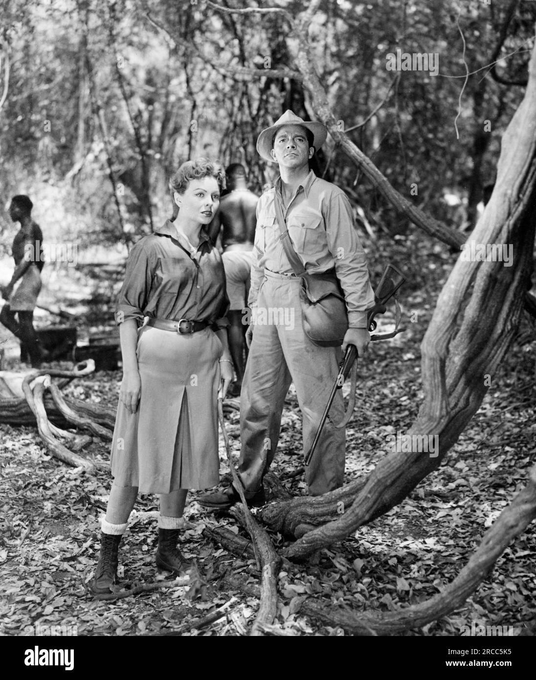 Jeanne Craine, Dana Andrews, on-set of the Film, "Duel In The Jungle ...