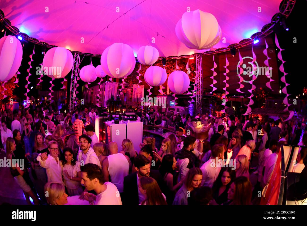 Munich, Germany. 13th July, 2023. Guests celebrate at the summer party ...