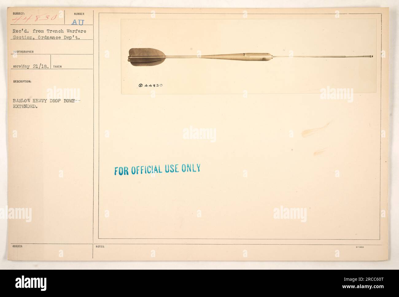 Soldiers inspecting a Barlow Heavy Drop Bomb during World War I. The ...