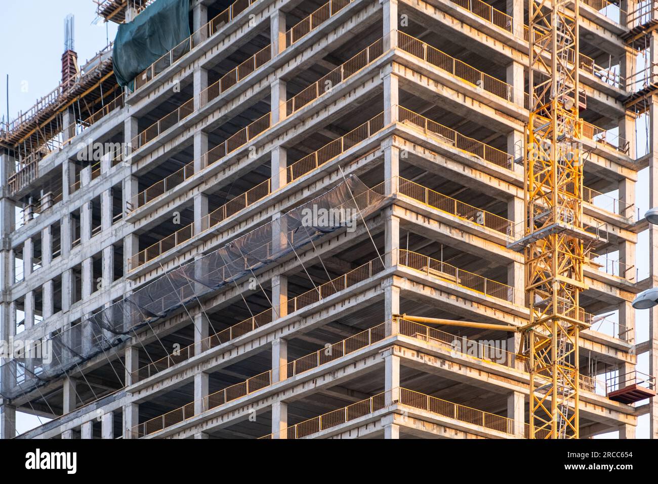 Construction syte of a reinforced concrete skyscraper. scaffolding and ...