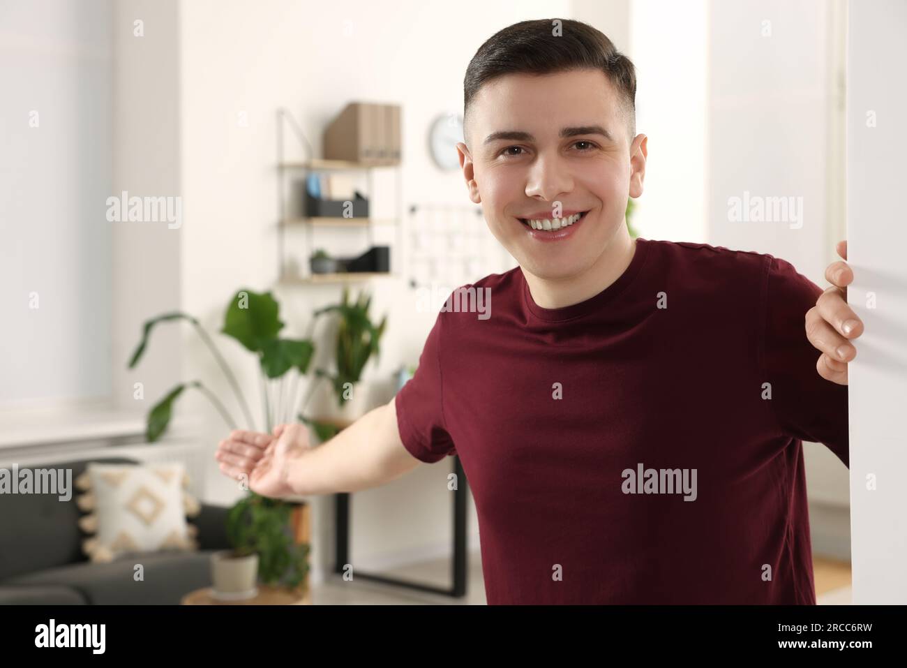 Welcome in house gesture hi-res stock photography and images - Alamy