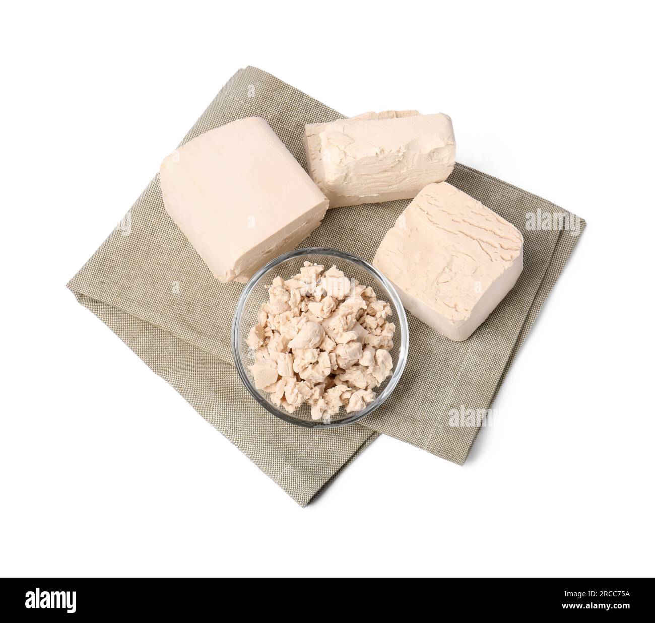 Pieces of compressed yeast isolated on white, top view Stock Photo - Alamy