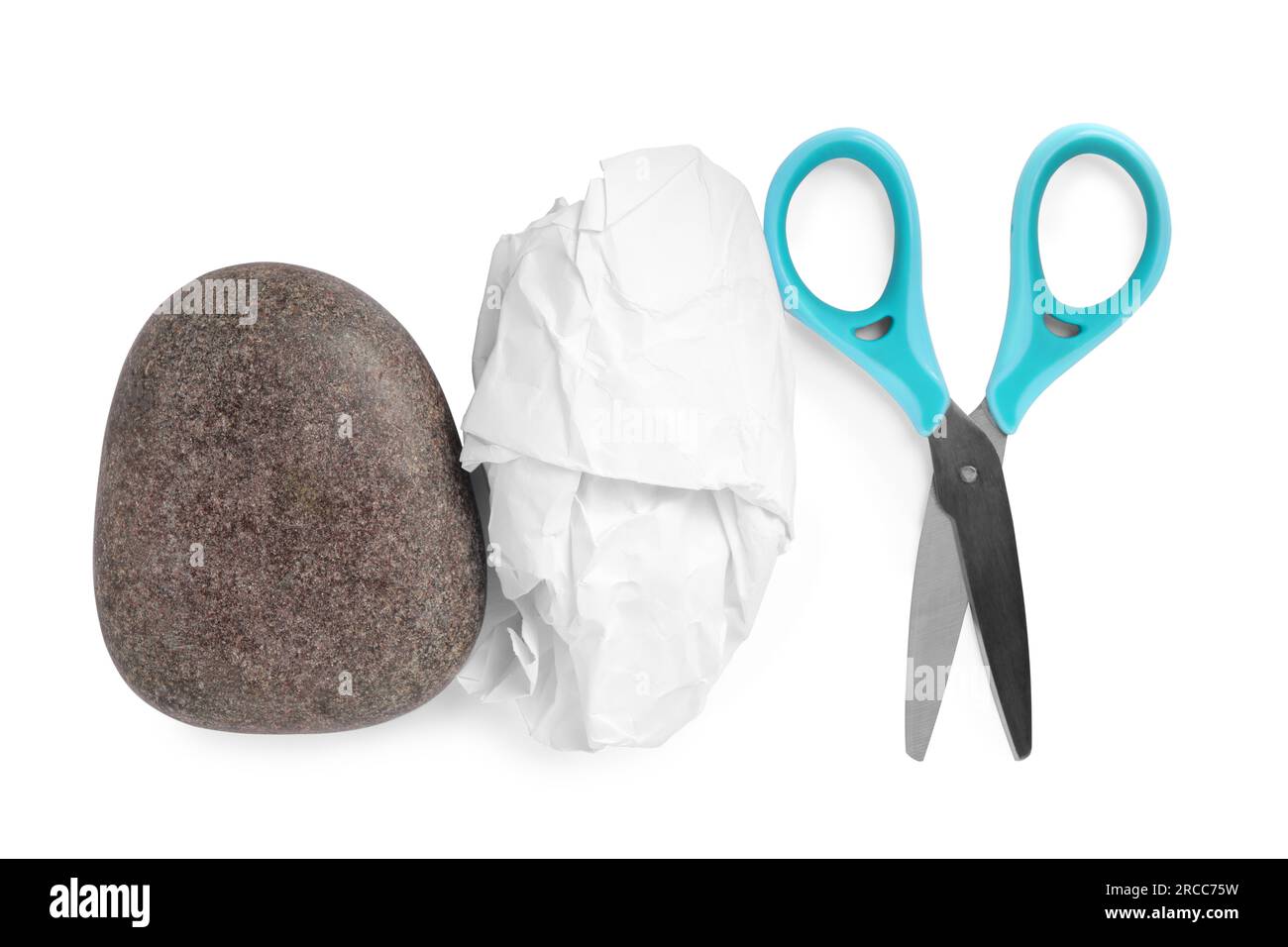 Rock, crumpled paper and scissors on white background, top view Stock ...
