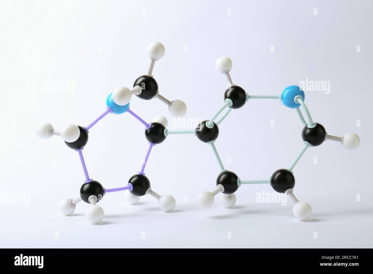 Molecule of nicotine on white background. Chemical model Stock Photo ...