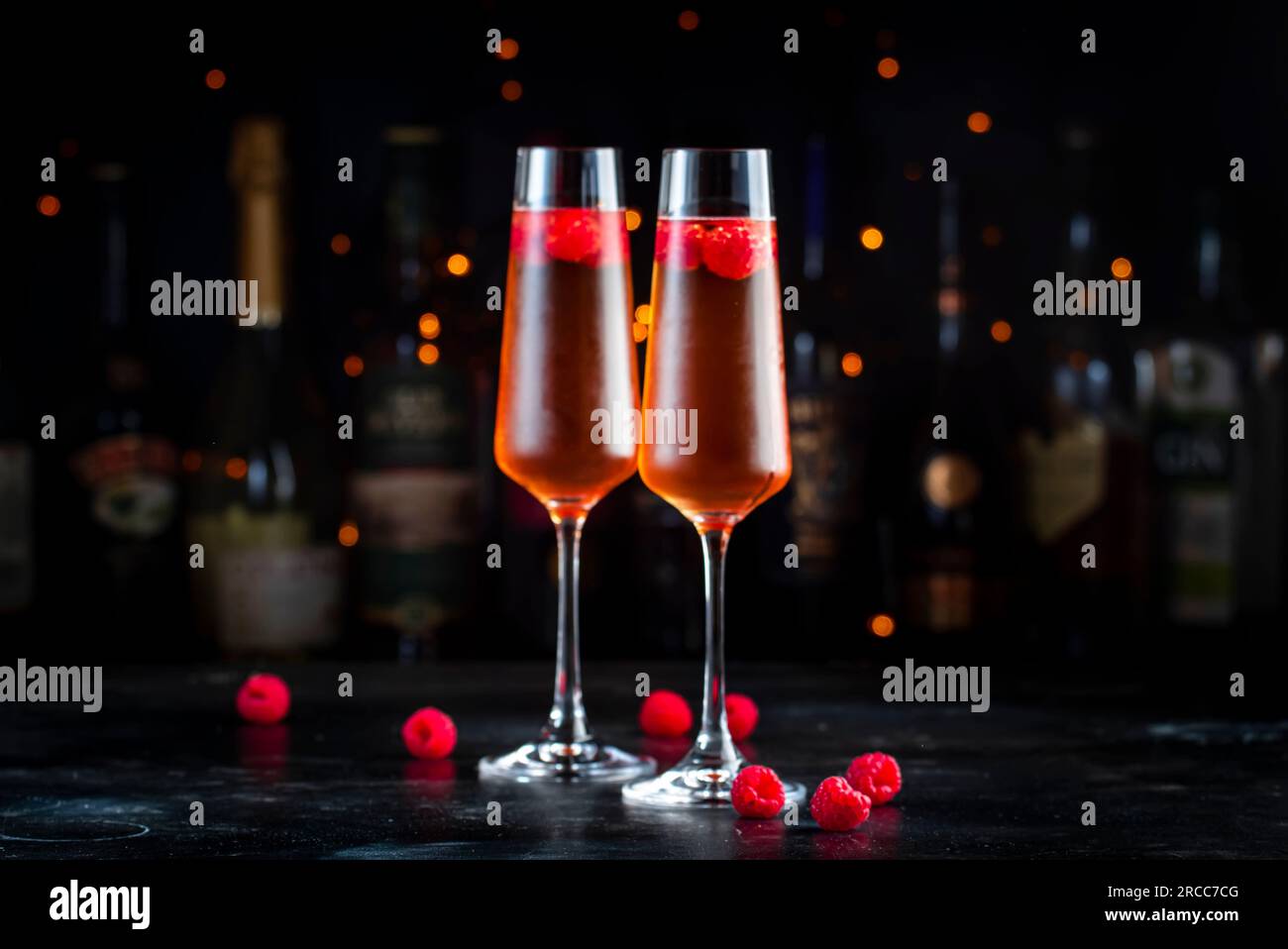 Raspberry Rossini alcoholic cocktail drink with prosecco, cava, or sparkling wine with raspberry ...