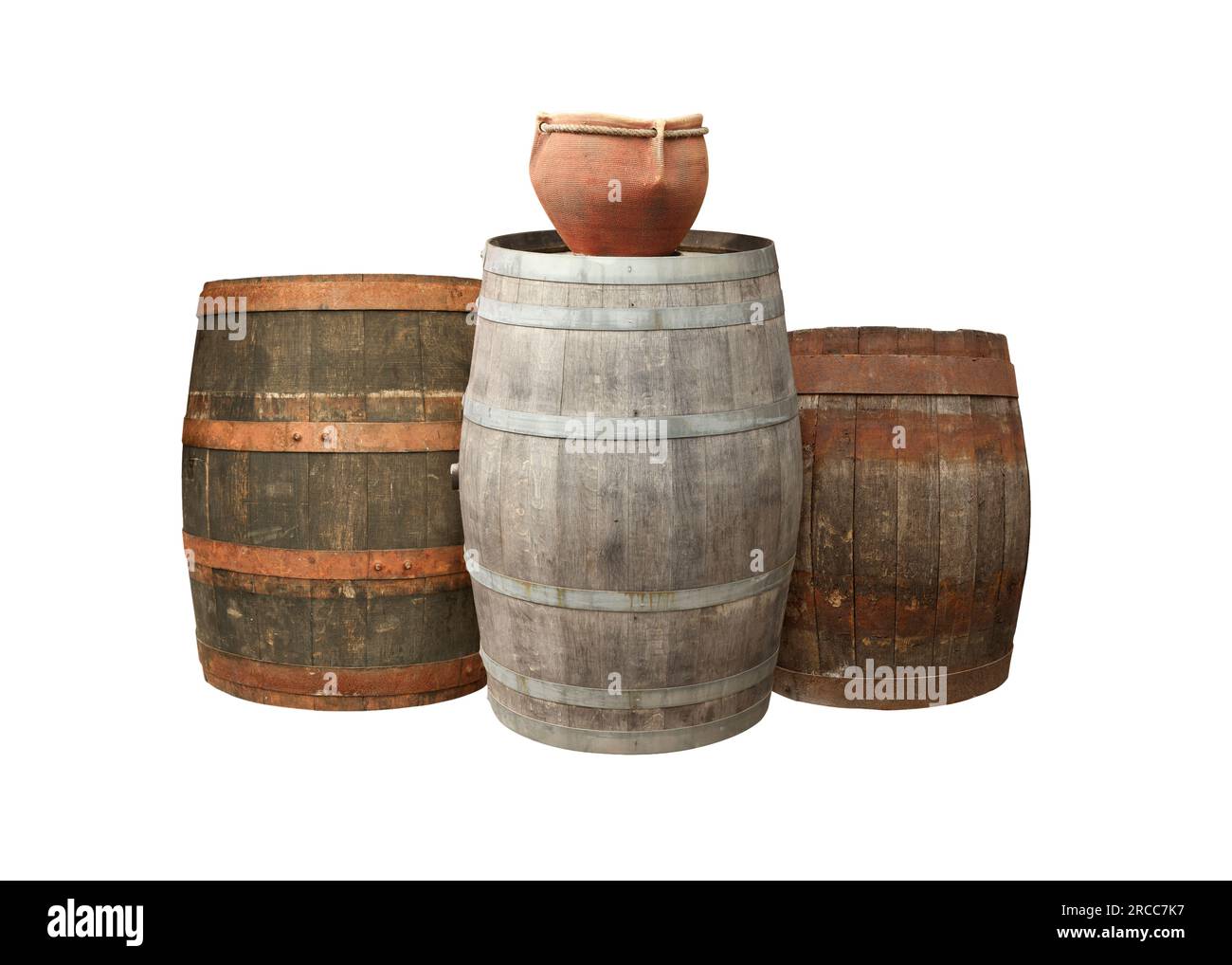 Many different wooden barrels and clay pot on white background Stock ...