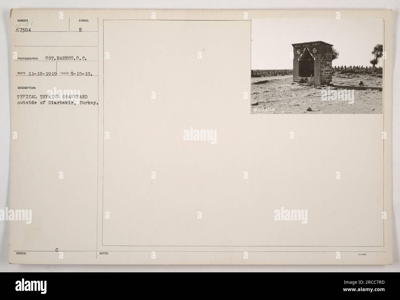 This photograph depicts a typical Turkish graveyard located outside of ...