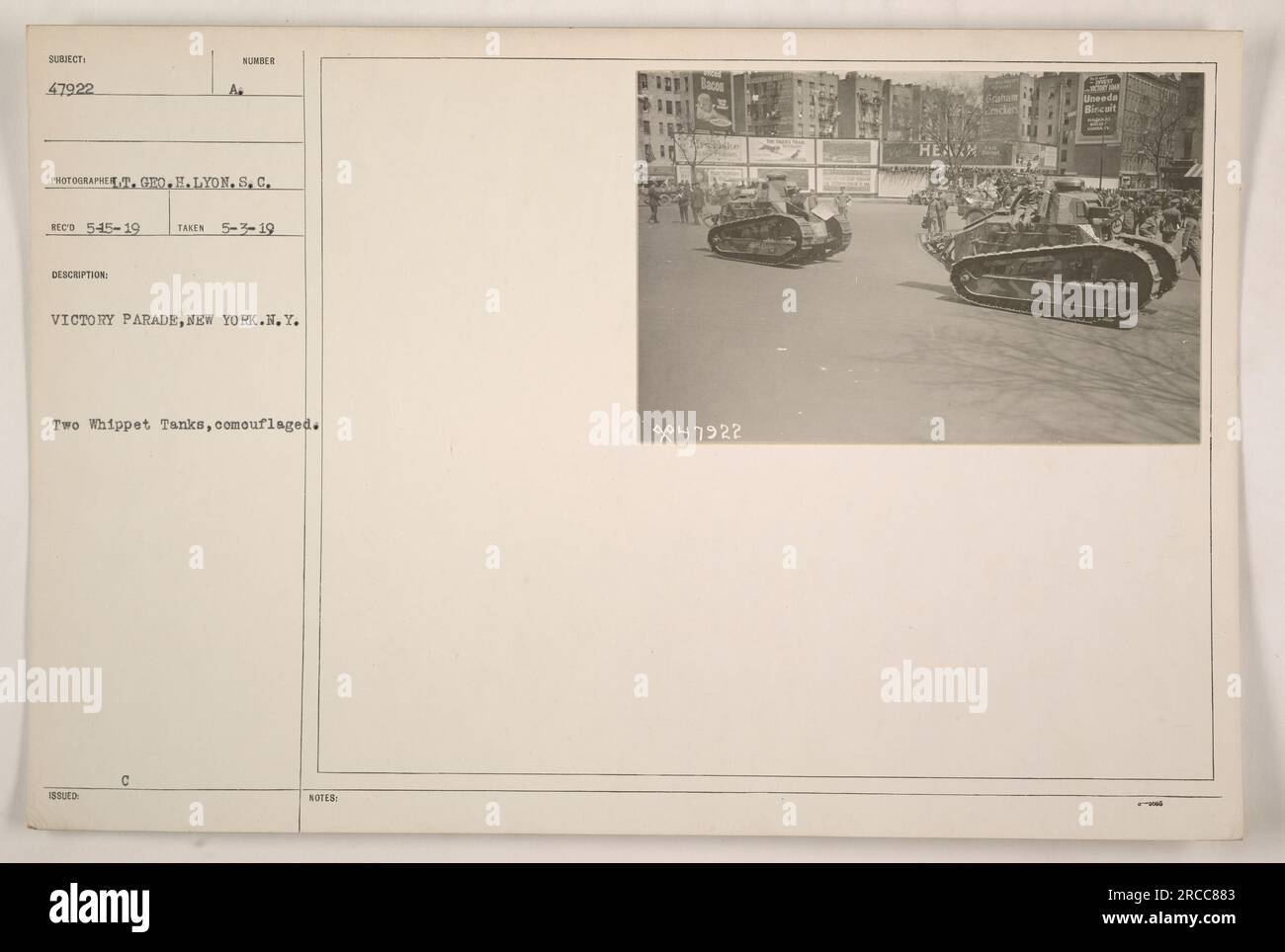 "Two camouflaged Whippet Tanks on display during a Victory Parade in ...