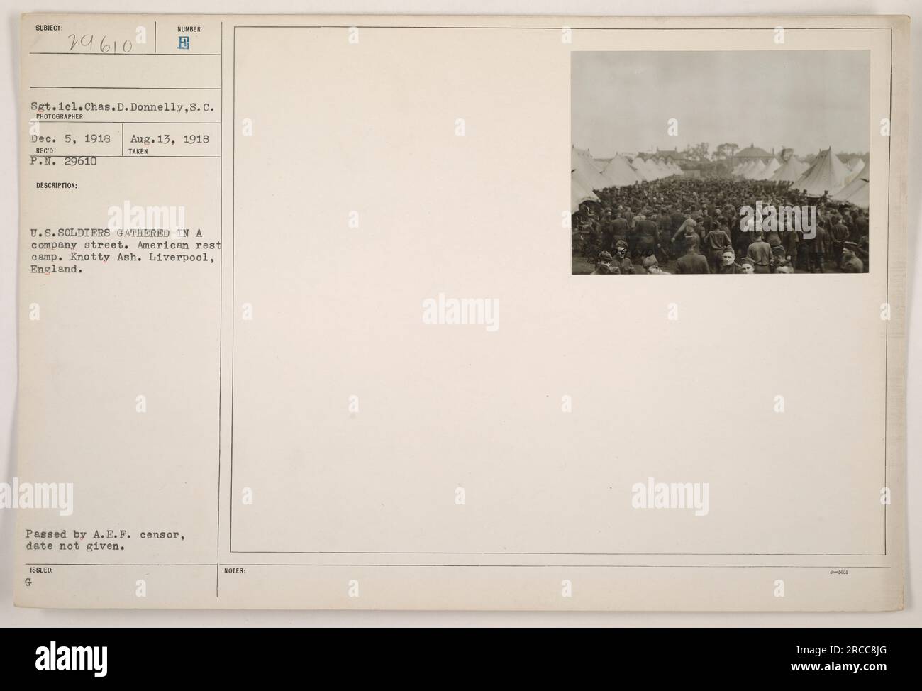 American soldiers gathered on a company street in Knotty Ash, Liverpool ...