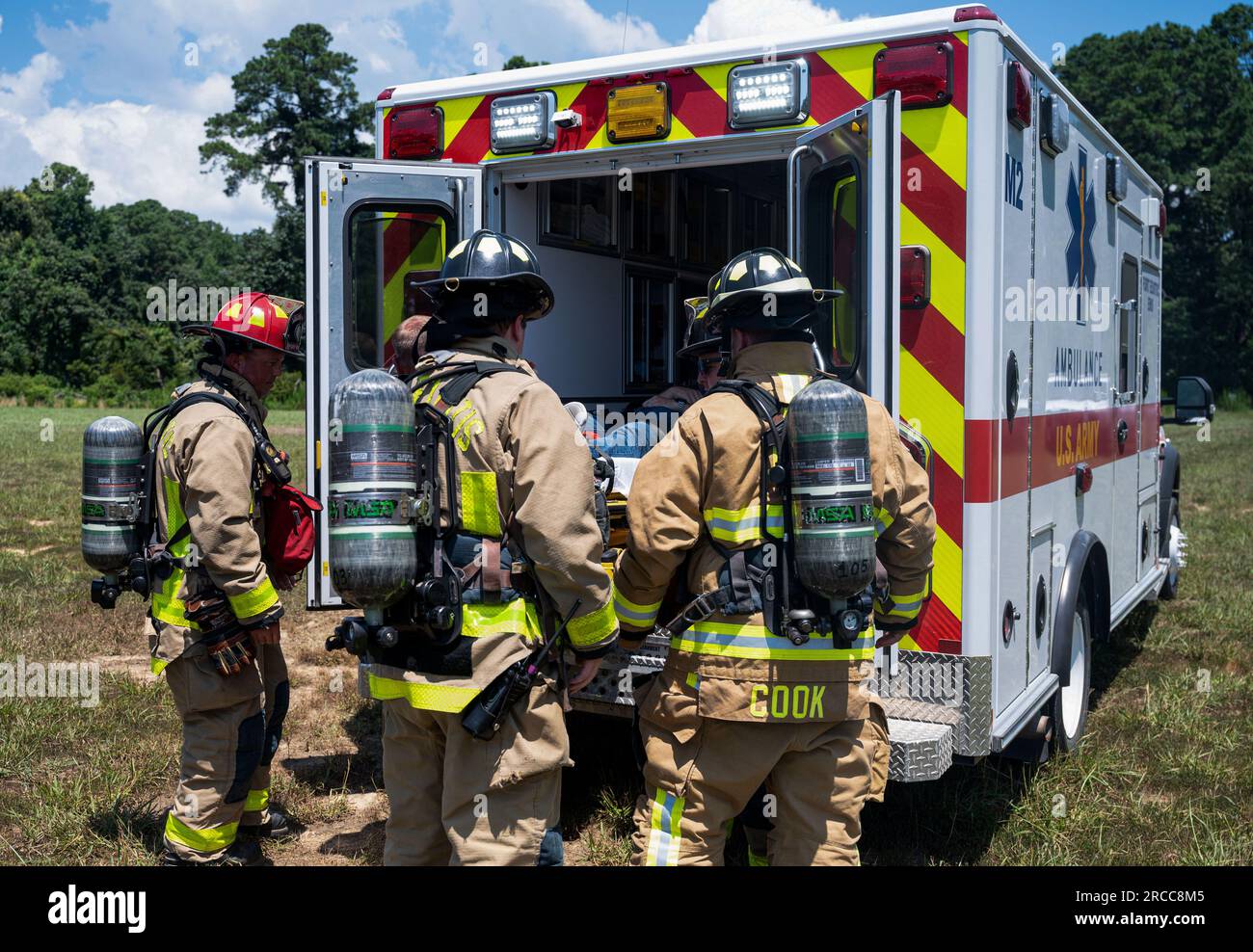 The 733d Civil Engineer Squadron fire department team loads the ...