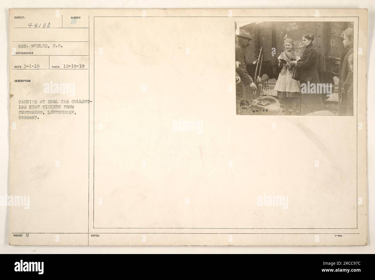 Sergeant Musler, a Signal Corps photographer, captures an image of a ...
