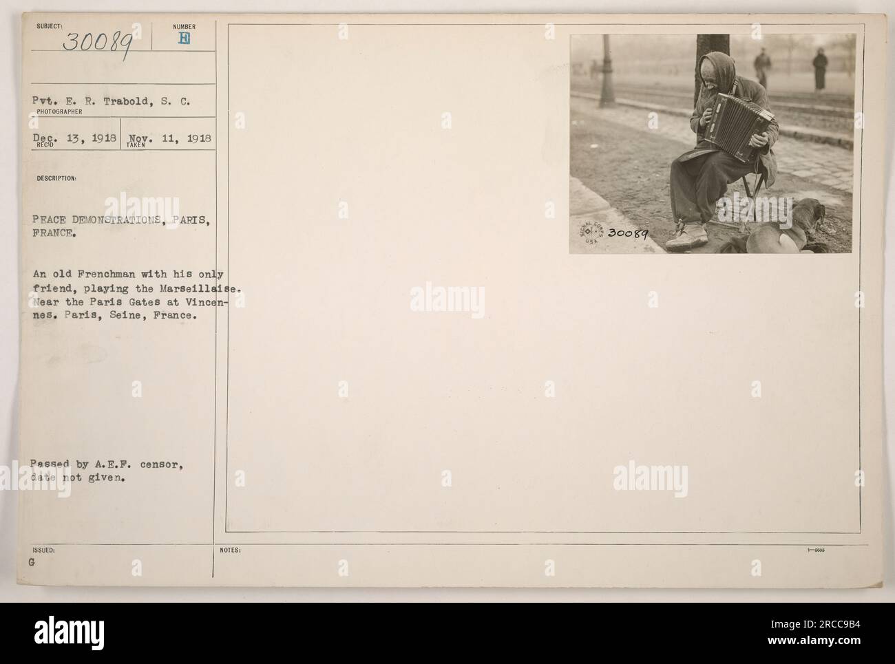 Pvt. E. R. Trabold, S.C., photographed an old Frenchman and his dog ...