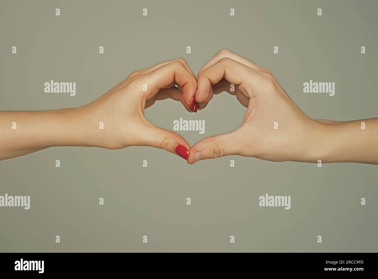 Female and male hands in form of heart. Hands in shape of love heart ...