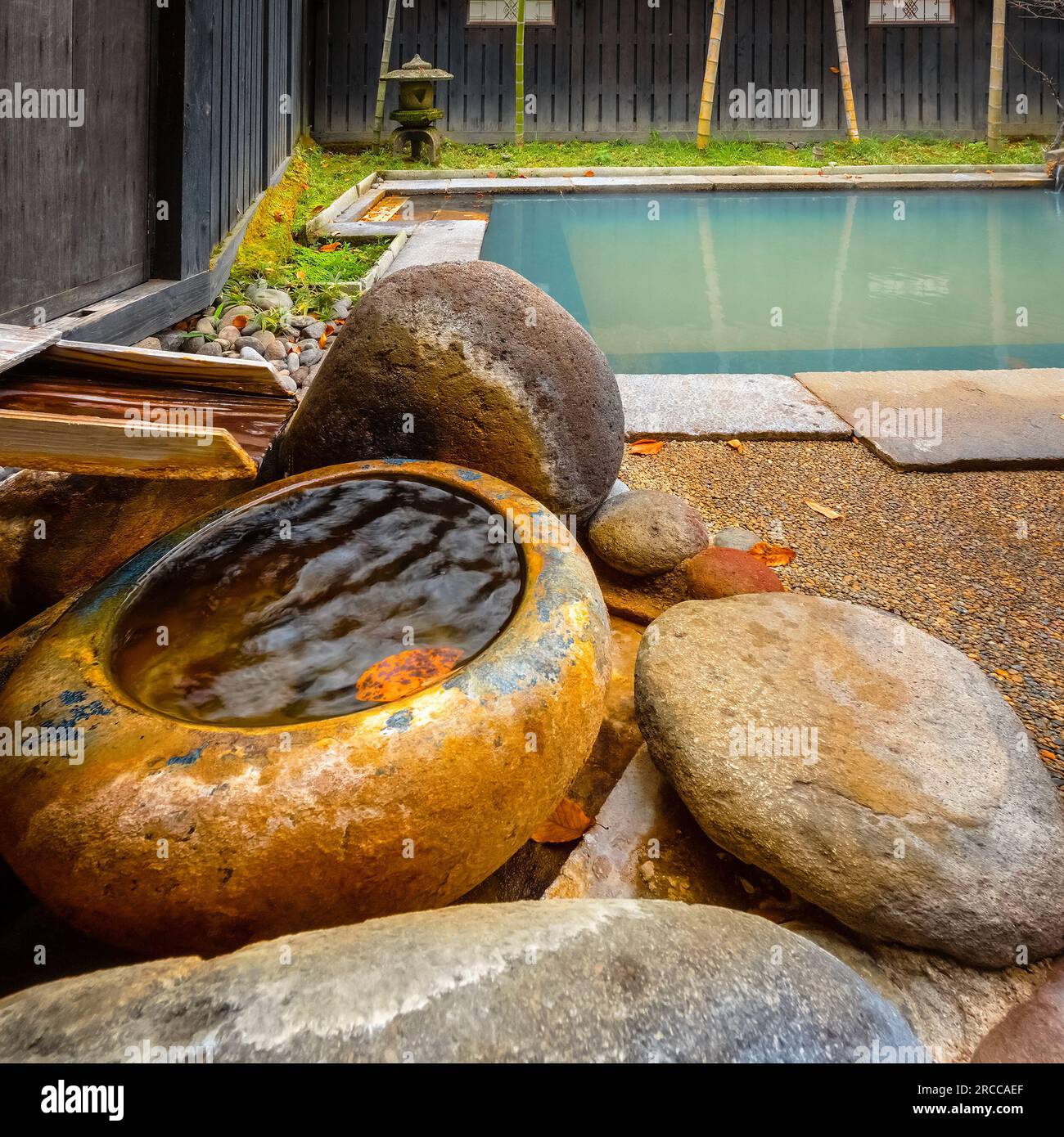 Kumamoto, Japan - Nov 22 2022: An open-air public bath surrounded by ...