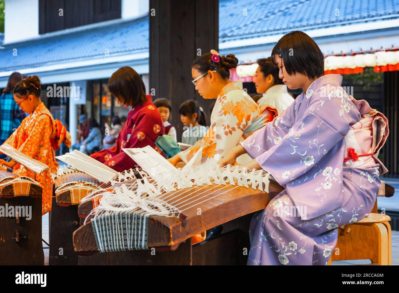 Kumamoto, Japan - Nov 23 2022: Unidentified group of people perform Koto, traditional japanese ...