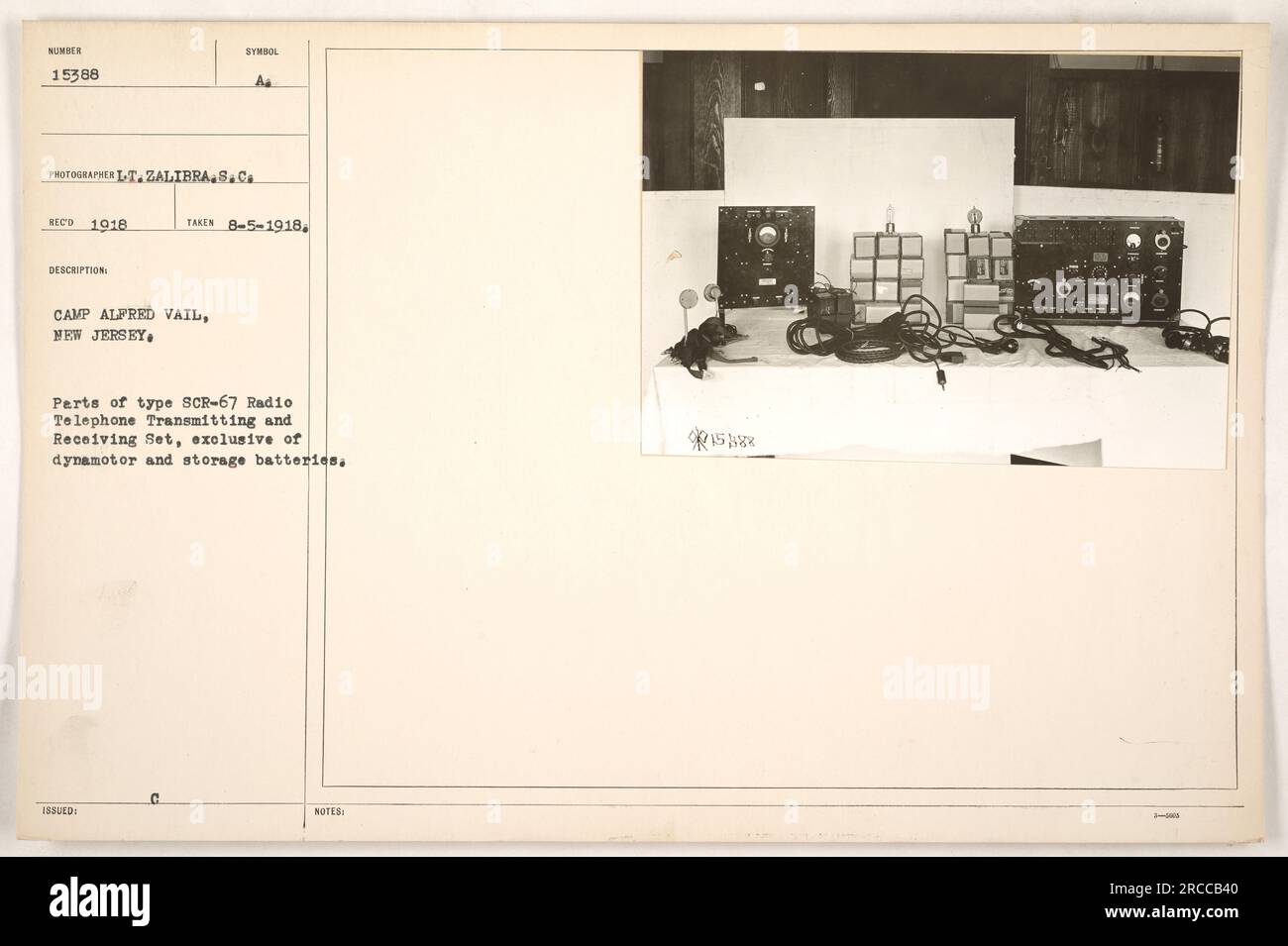 Soldiers at Camp Alfred Vail, New Jersey, are shown with parts of a SCR ...