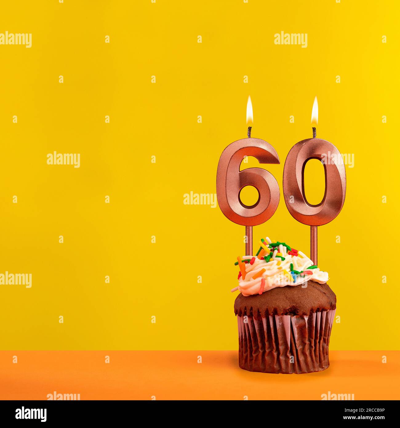 Number 60 birthday candle - Celebration on yellow background Stock ...