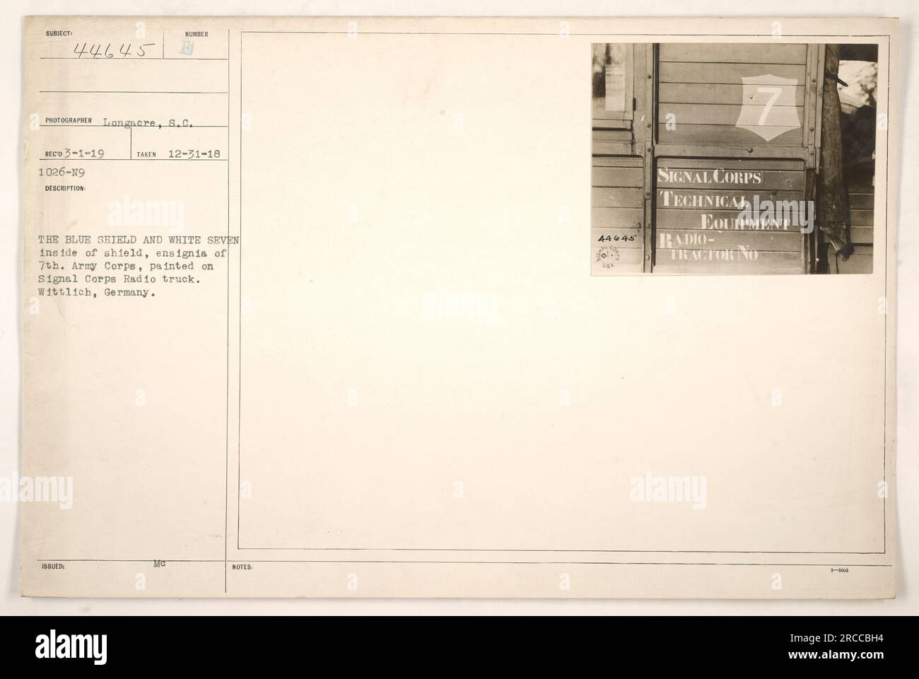 The Blue Shield and White Seven insignia of the 7th Army Corps is seen ...